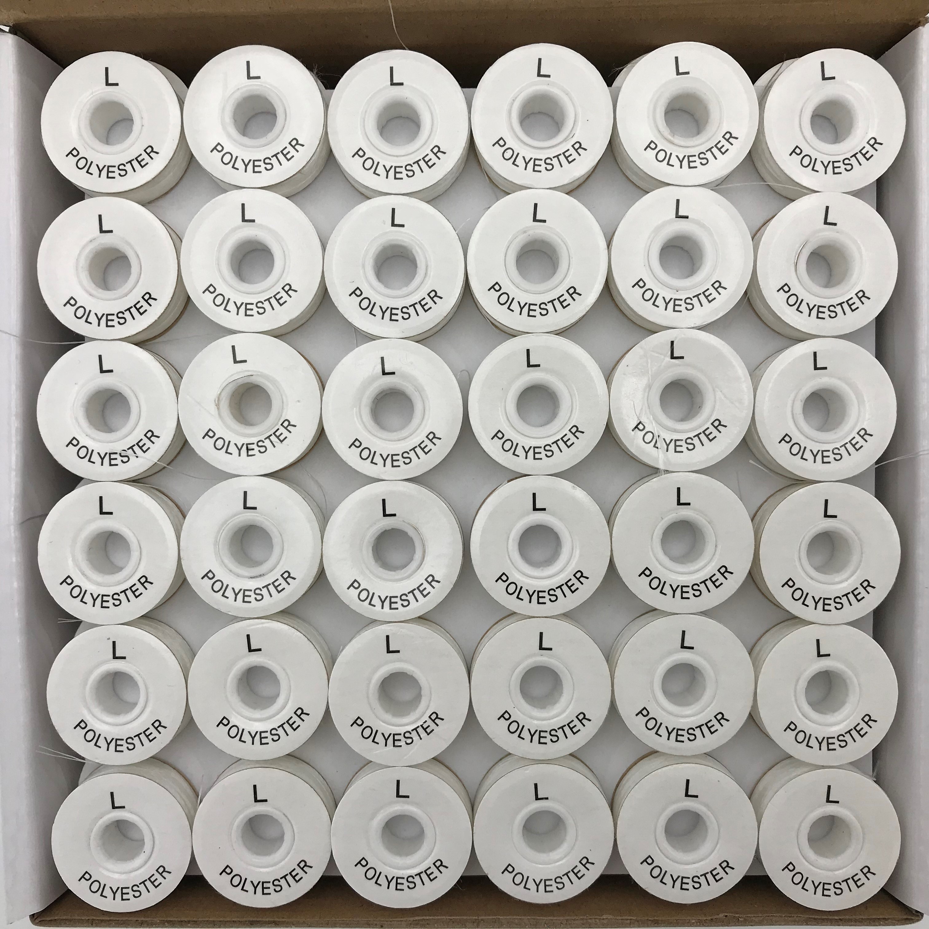 PinPoint International: Style L-EC White Polyester Cardboard Sided Bobbins